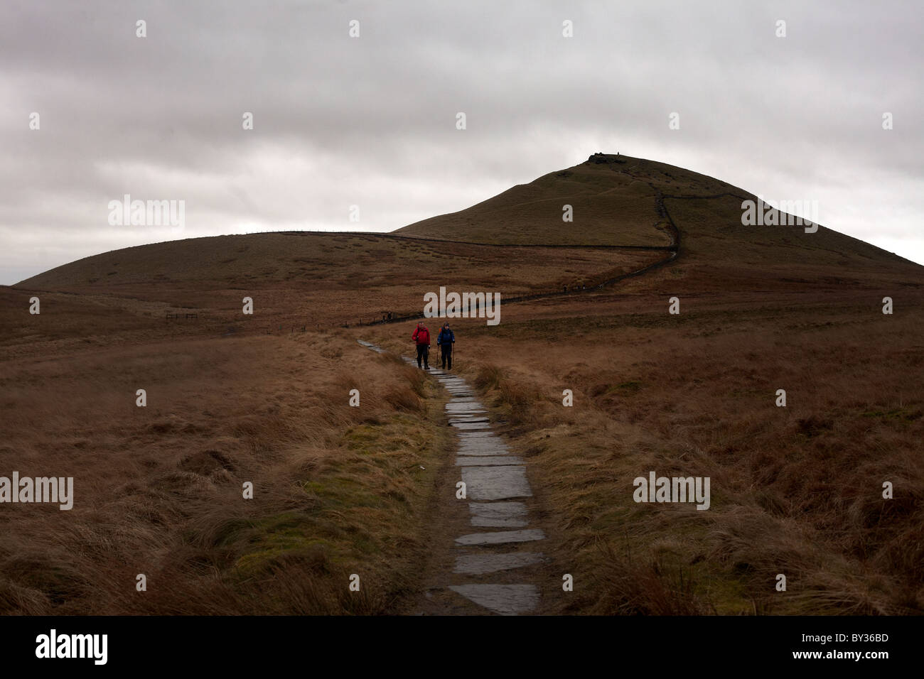 walkers walk at Shutlingsloe hill in the peak district near ...
