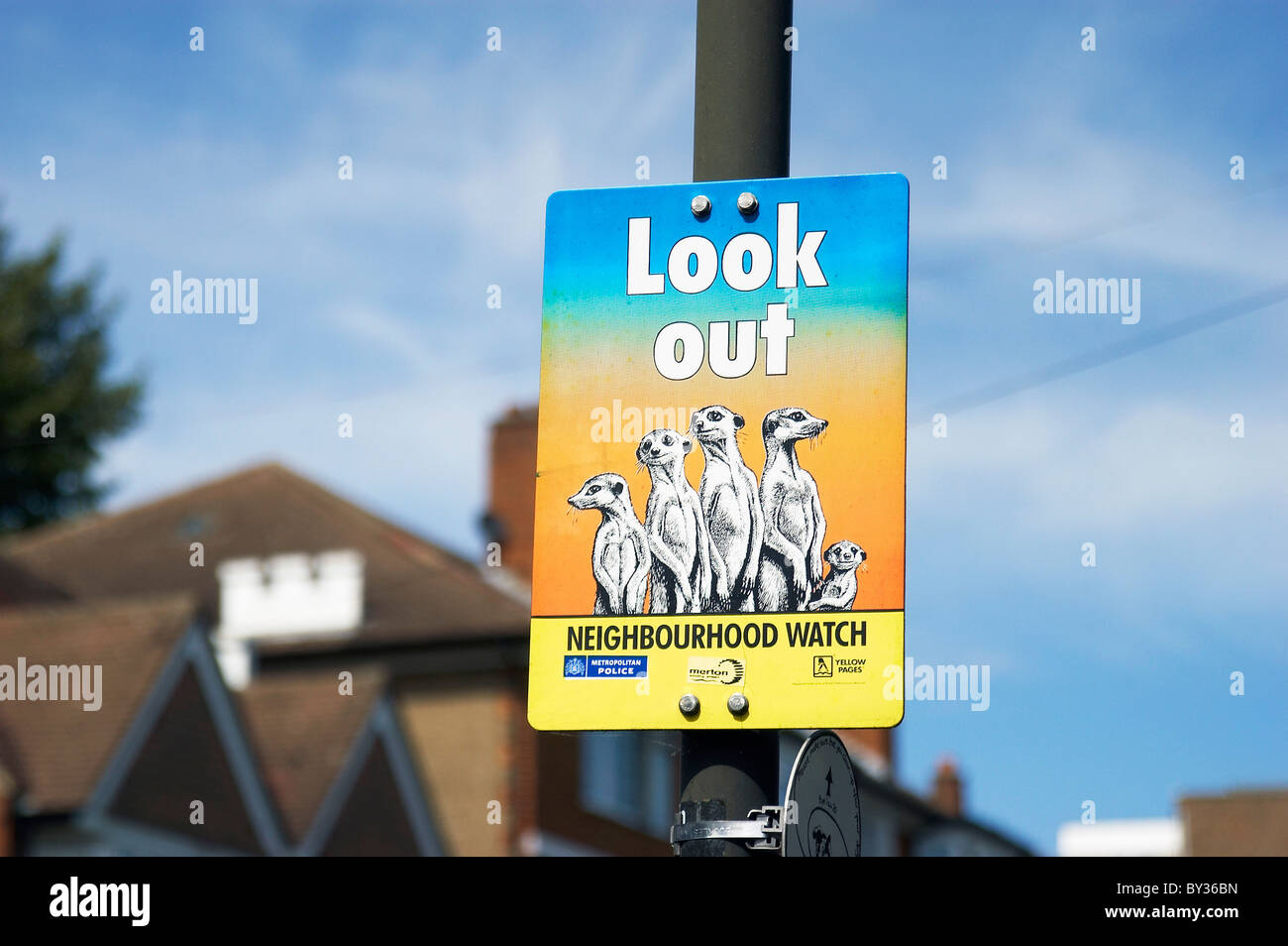 Look out sign on a lamp post in a suburban area. London Stock Photo - Alamy