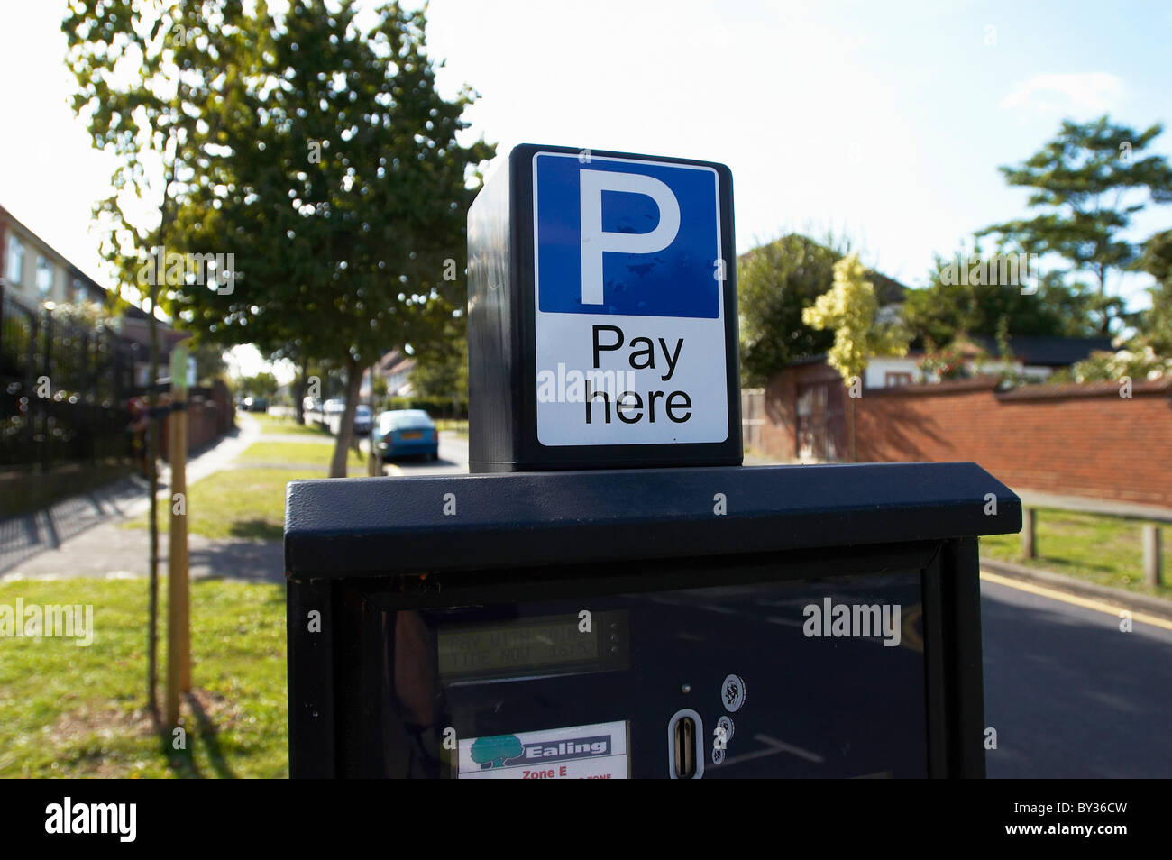 Parking meter in a residential area London Stock Photo - Alamy