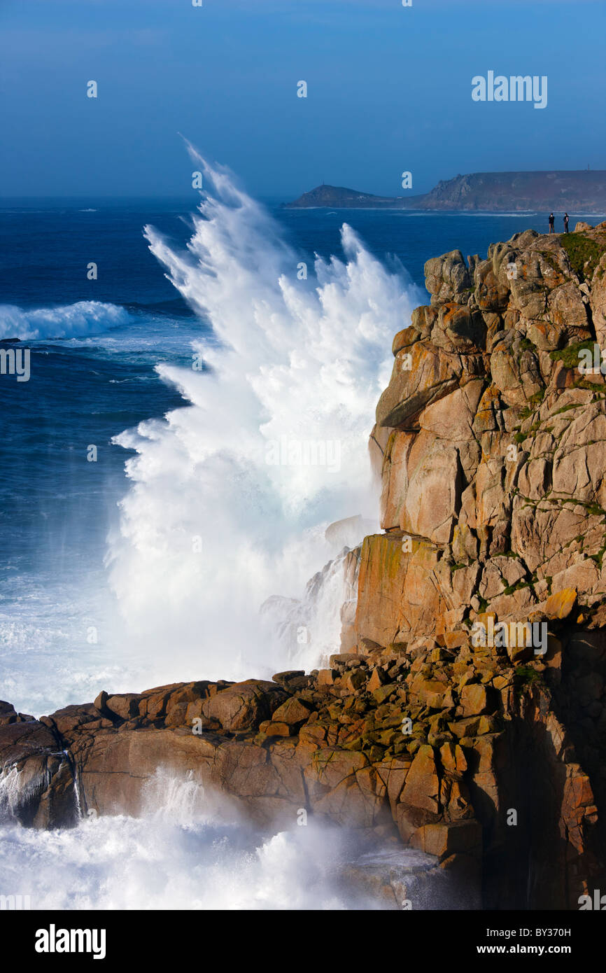 Huge waves crash on to the Cornish coast smashing against the cliffs ...