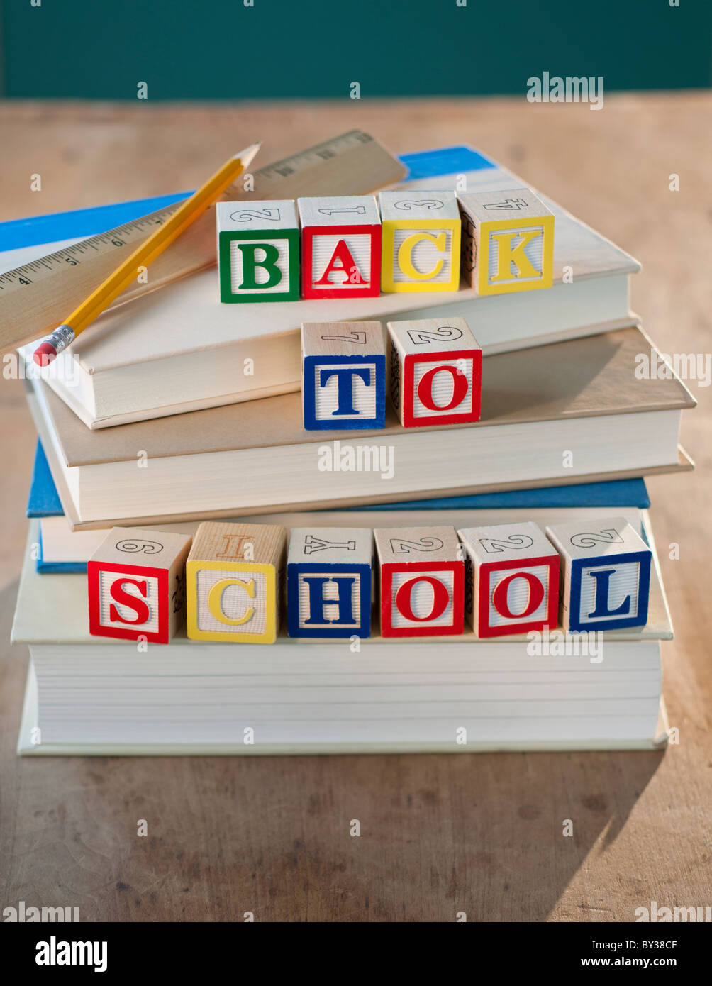 Back to school building blocks on stacked books pencil and ruler Stock ...