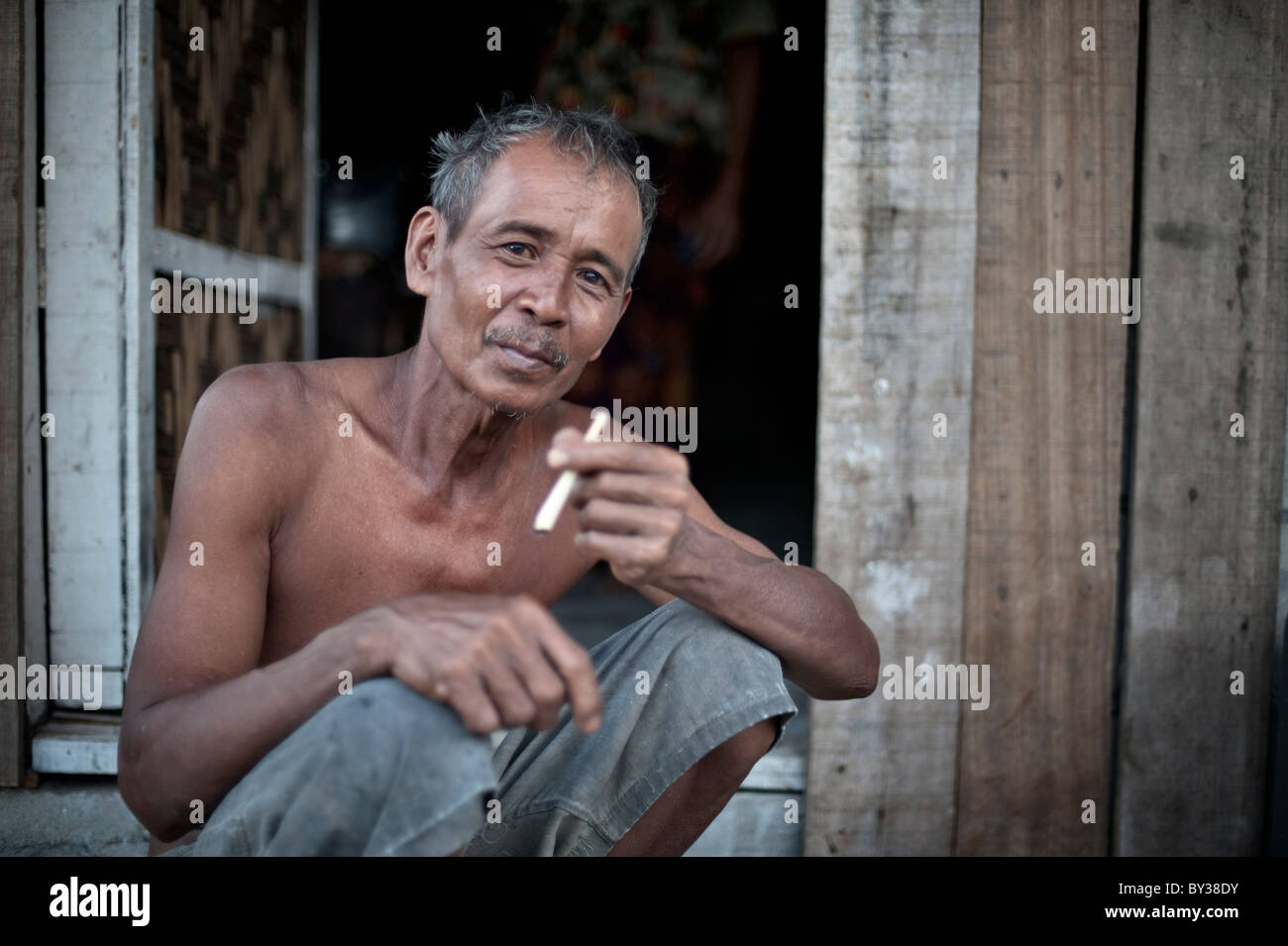 Fisherman smoking cigarette hi-res stock photography and images - Alamy