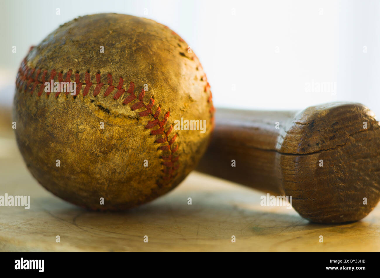 Antique baseball with baseball bat Stock Photo - Alamy