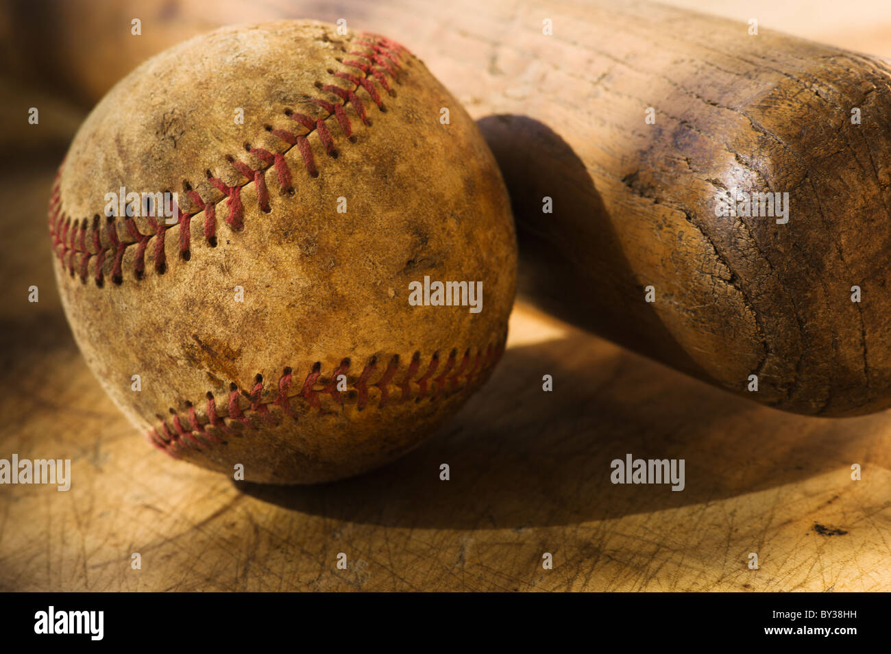 Antique baseball with baseball bat Stock Photo - Alamy