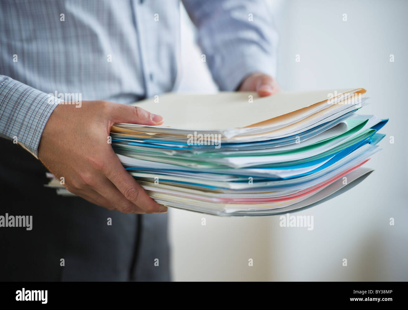 Carrying paperwork hi-res stock photography and images - Alamy