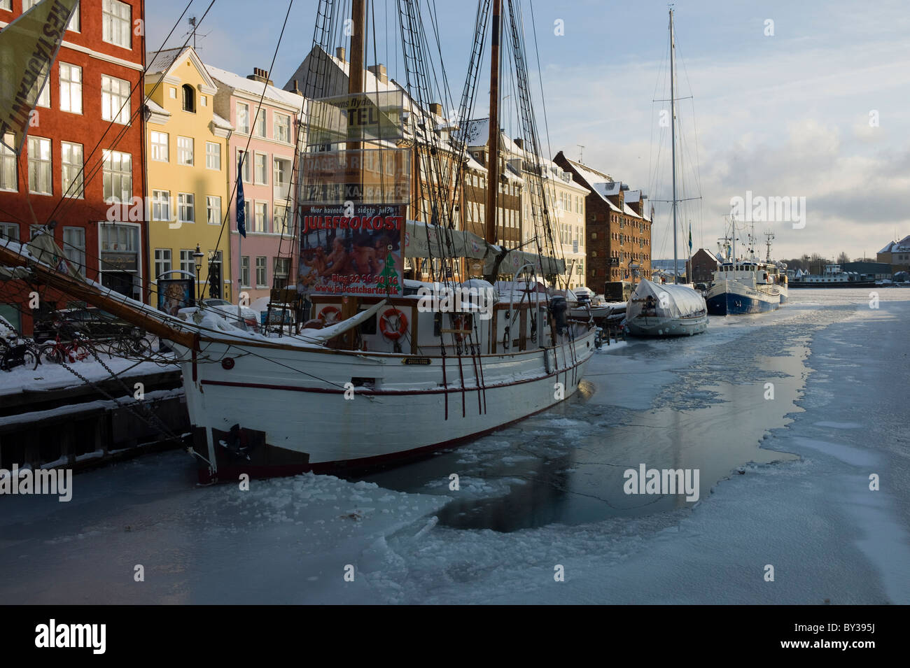 Frozen canal/sea at Nyhavn, (New Harbour) Copenhagen, Denmark at ...
