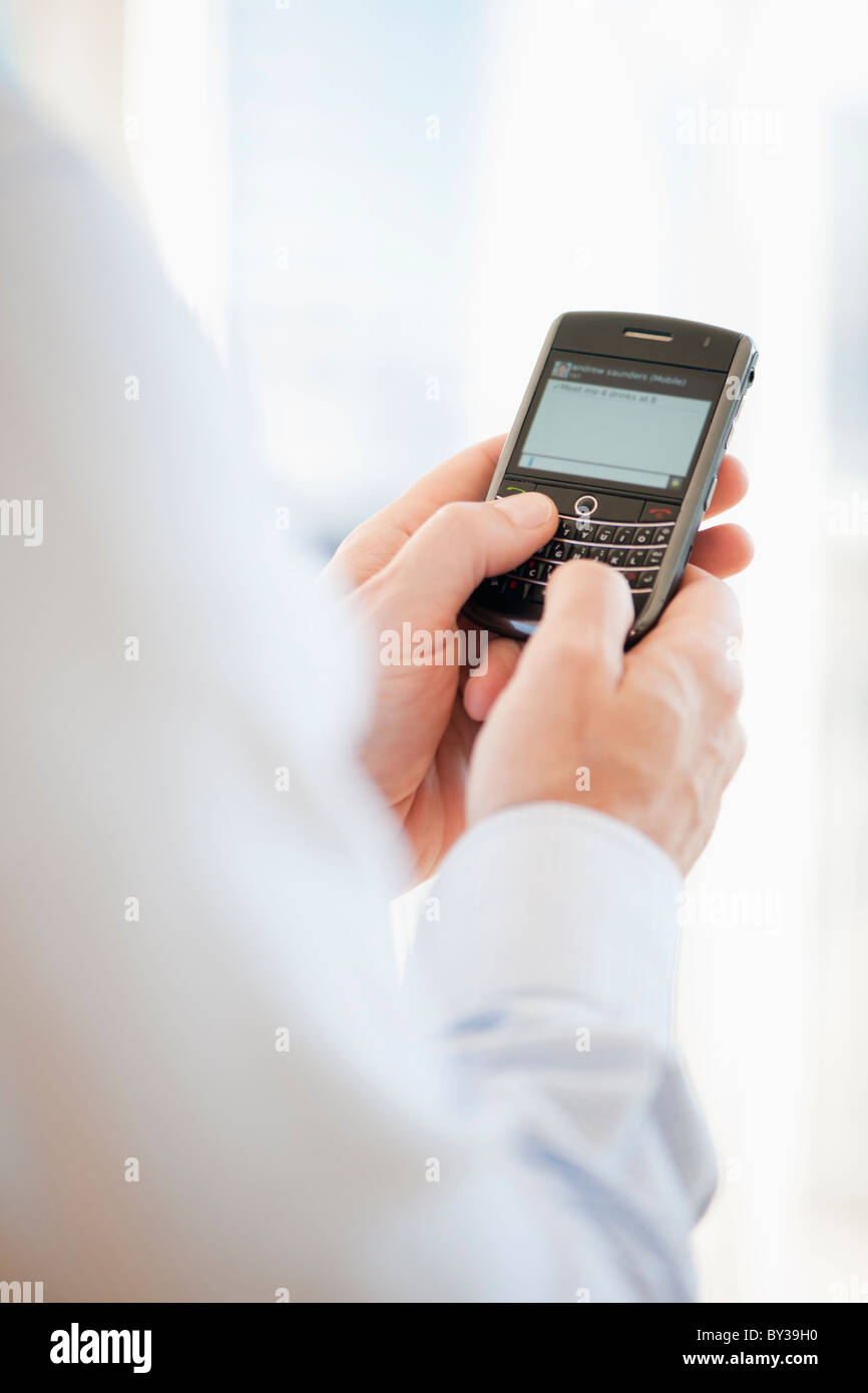 Hand holding mobile phone vertical hi-res stock photography and images ...
