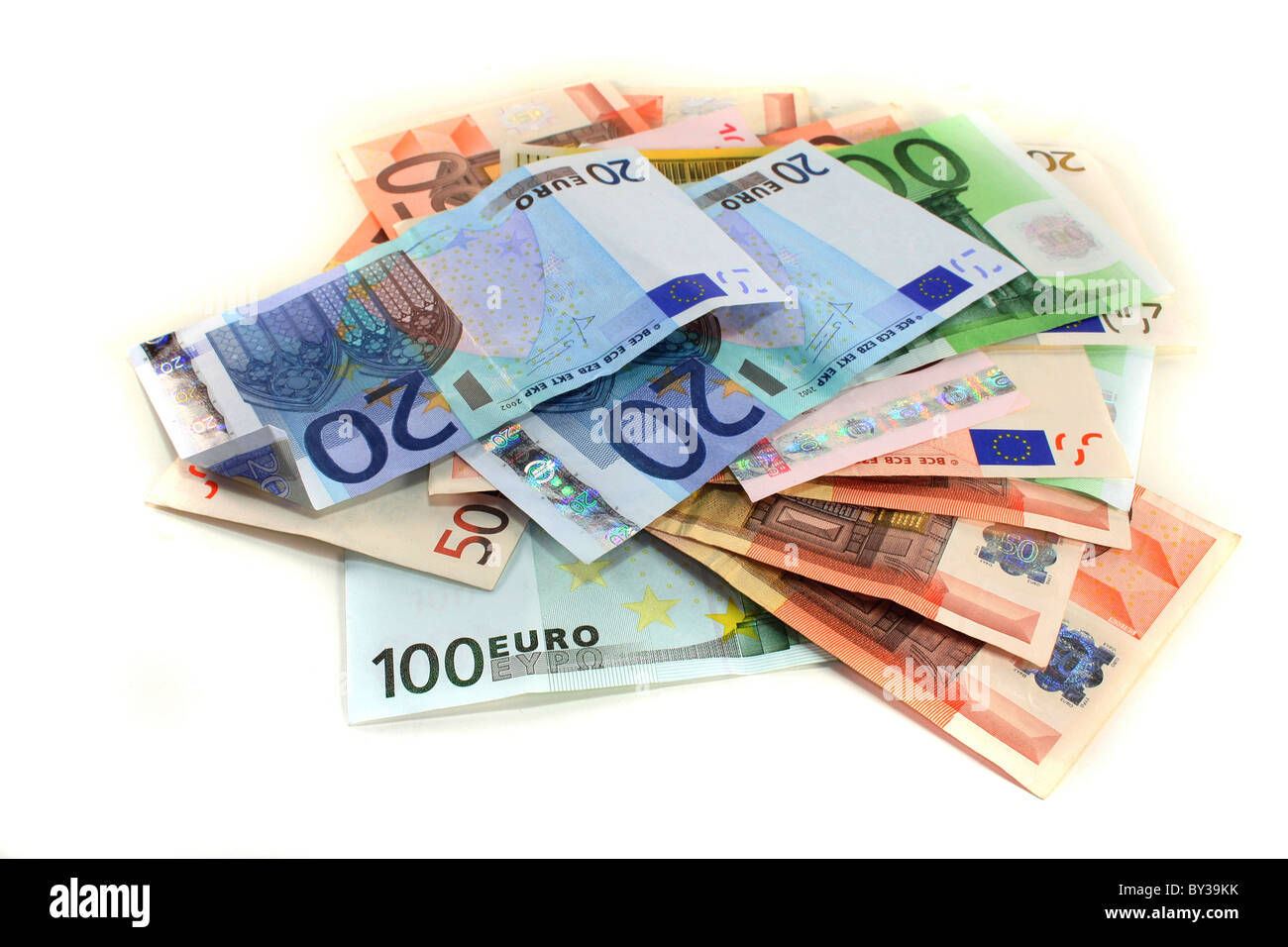 a big pile of euro notes on a white background Stock Photo - Alamy
