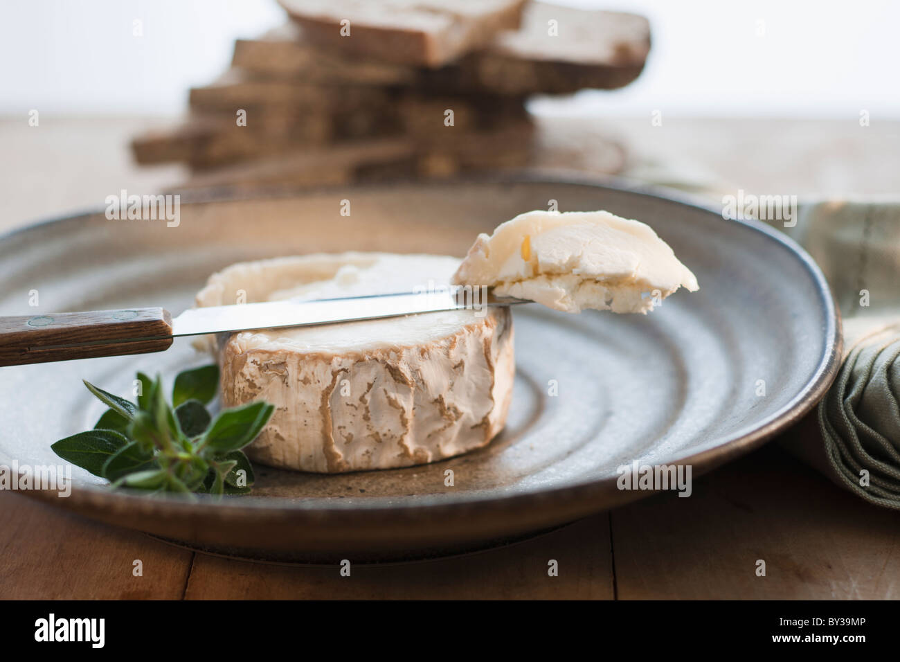 Brie cheese on plate Stock Photo - Alamy