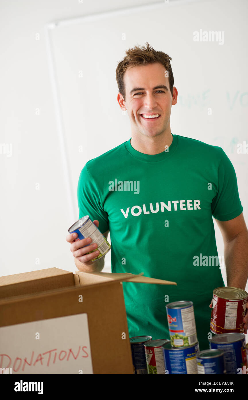 USA, New Jersey, Jersey City, Portrait of young man as volunteer Stock ...