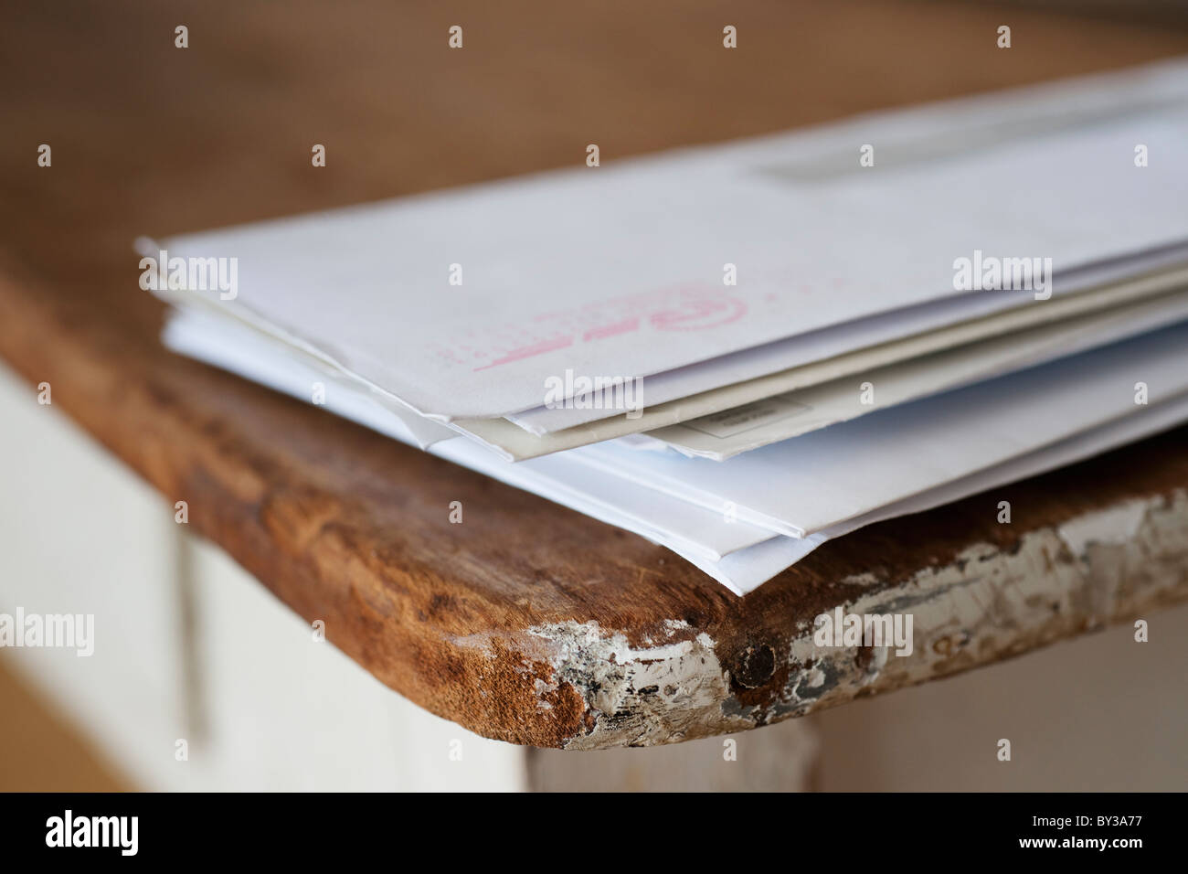 Letters on the egde of table Stock Photo - Alamy