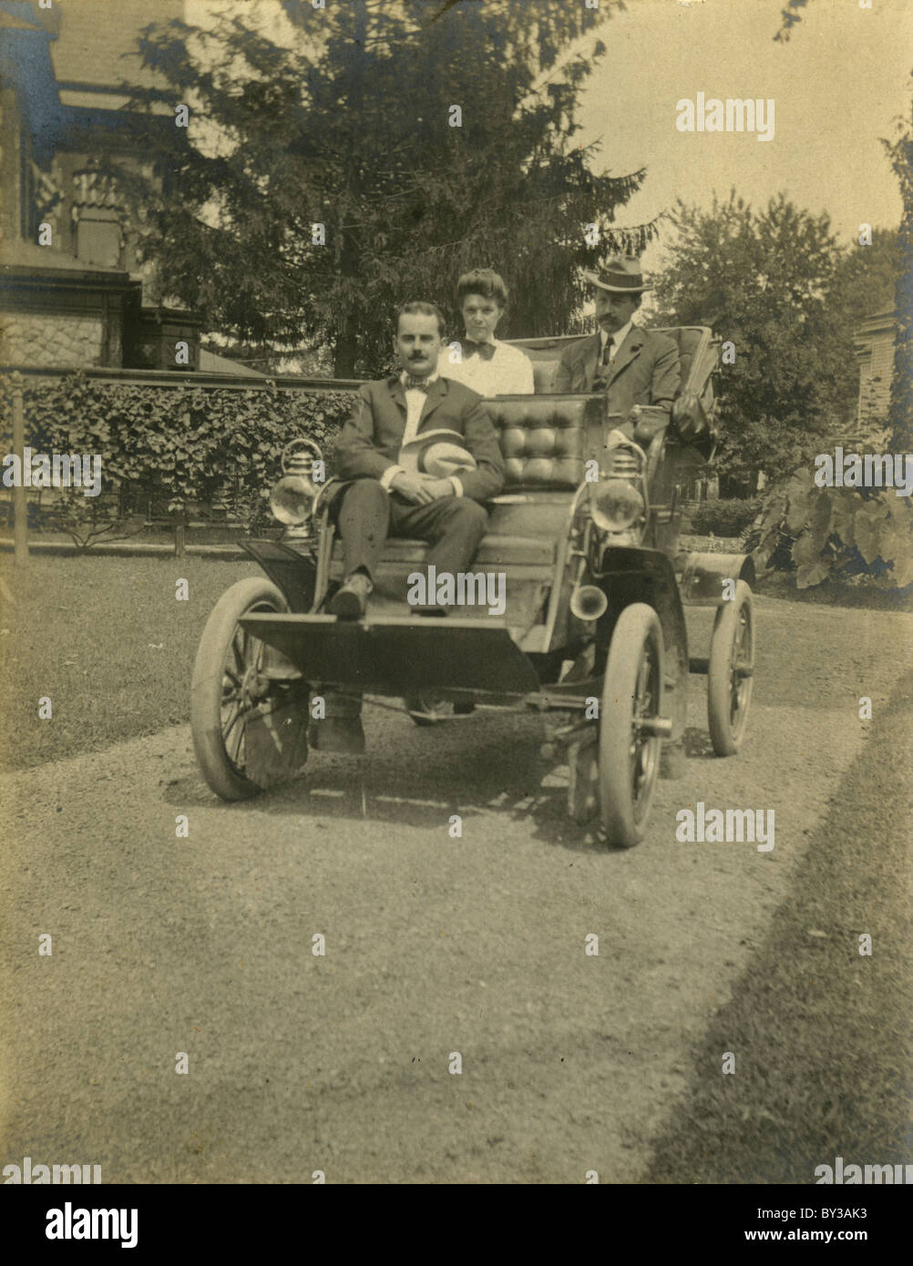 Circa 1910 antique photograph, a Runabout style car. Location unknown ...