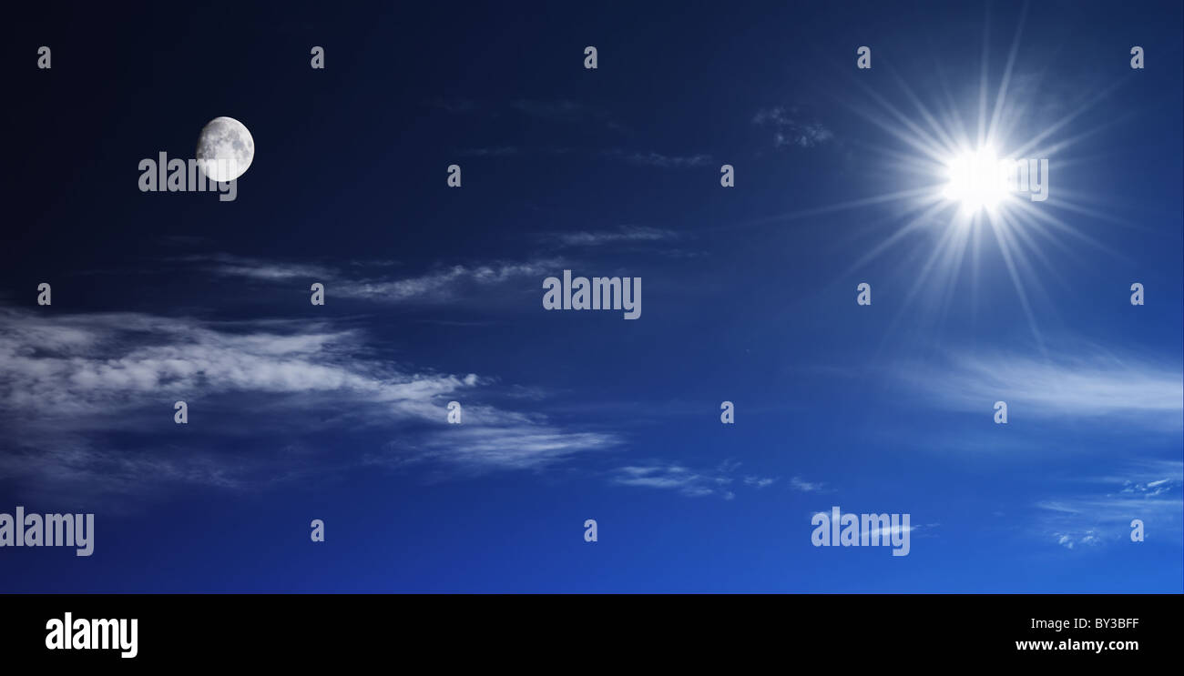 Sun and moon shinning in a deep blue sky Stock Photo - Alamy