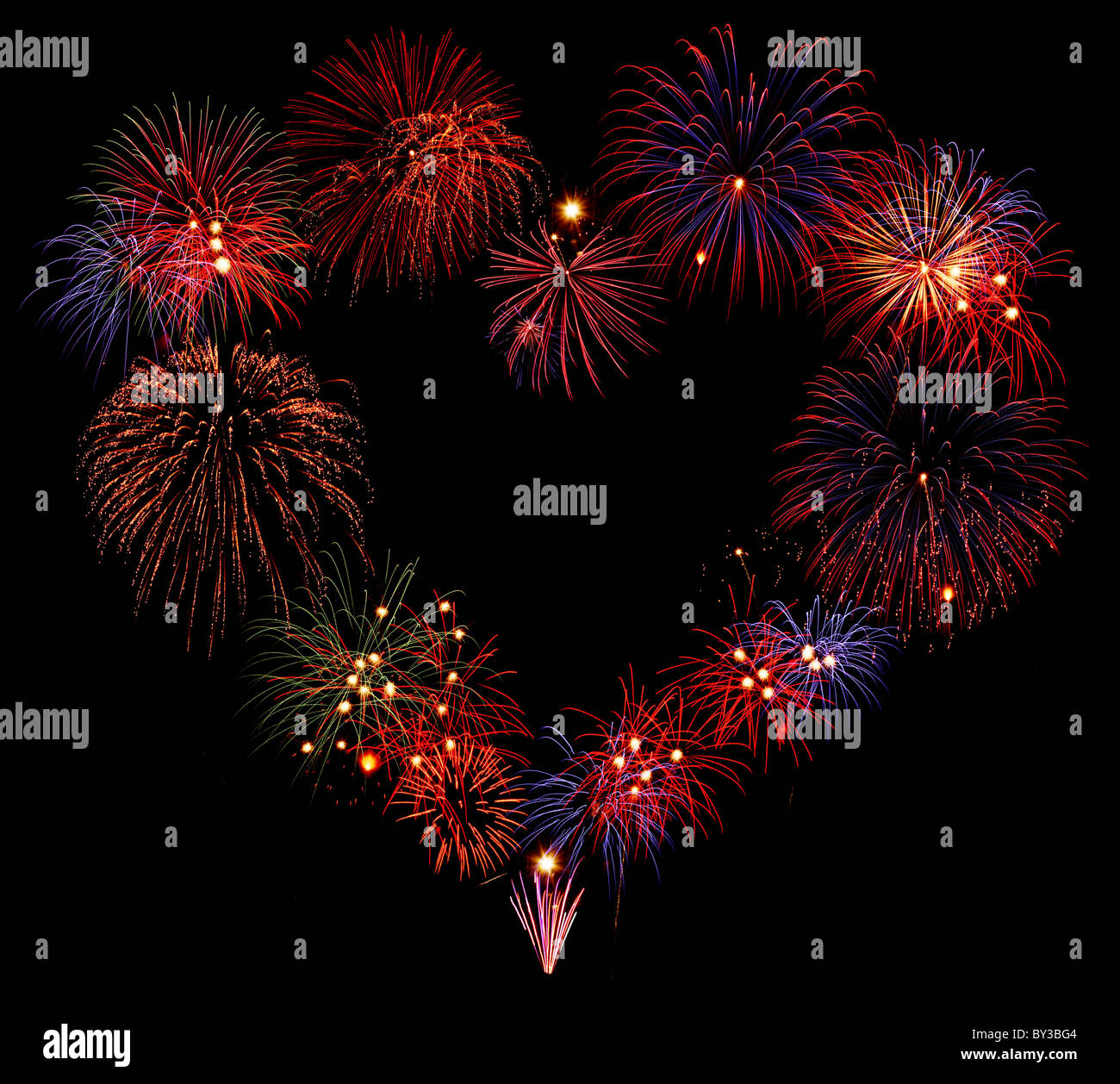 Heart shape firework composition Stock Photo - Alamy