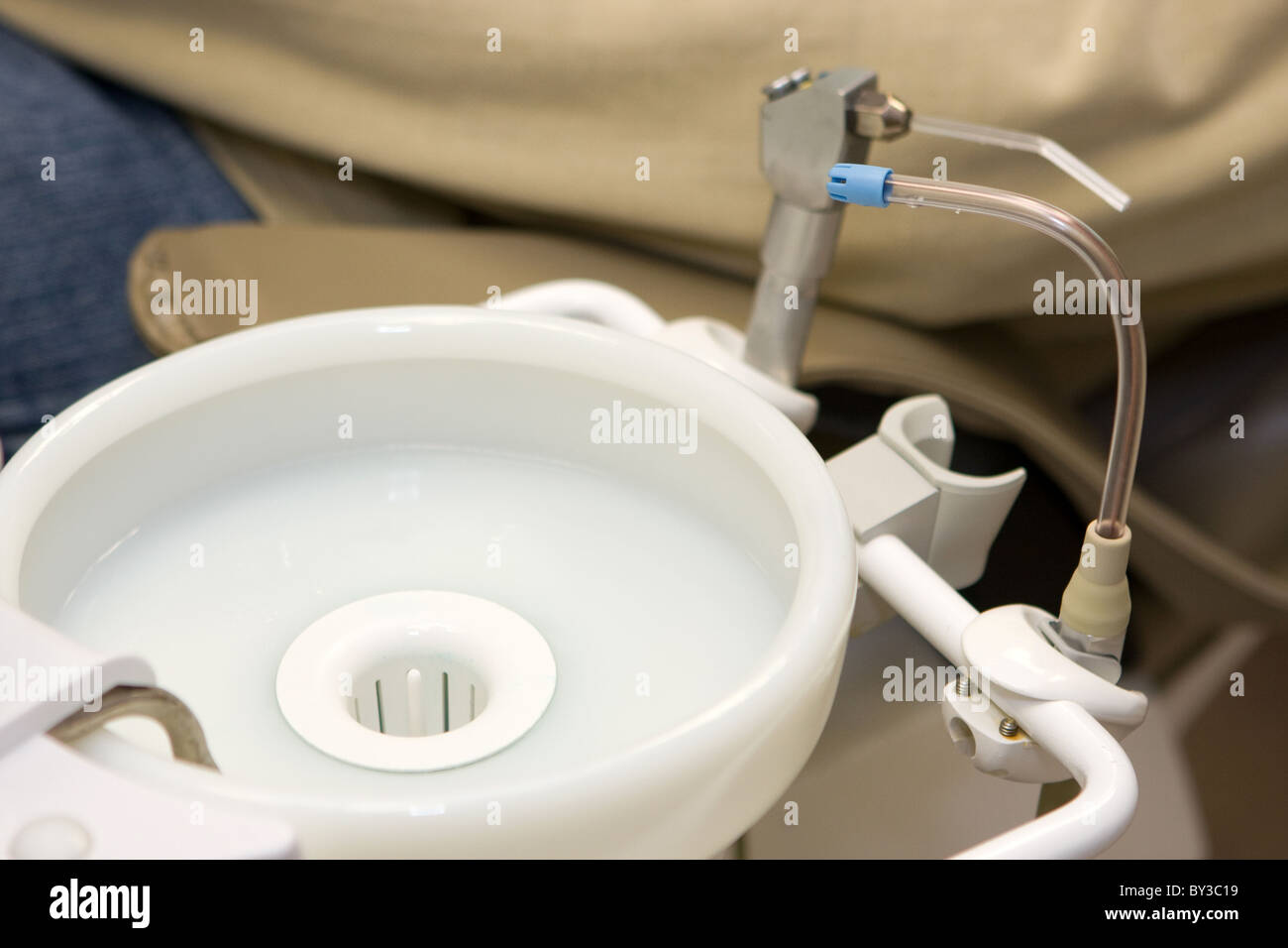 Dental patient's spitting sink used to rinse out mouth during teeth ...