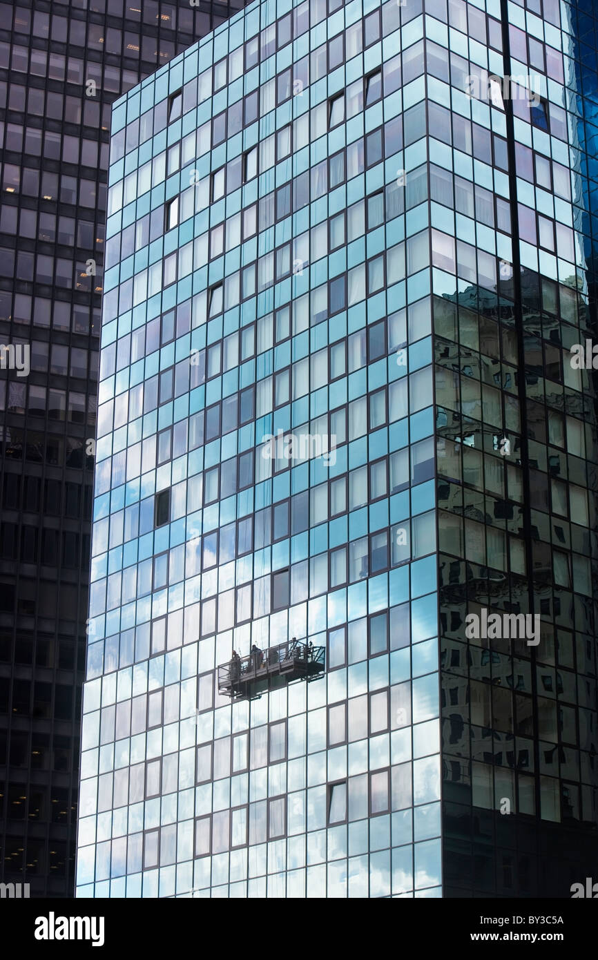 USA, New York City, Manhattan, window cleaning platform on building ...