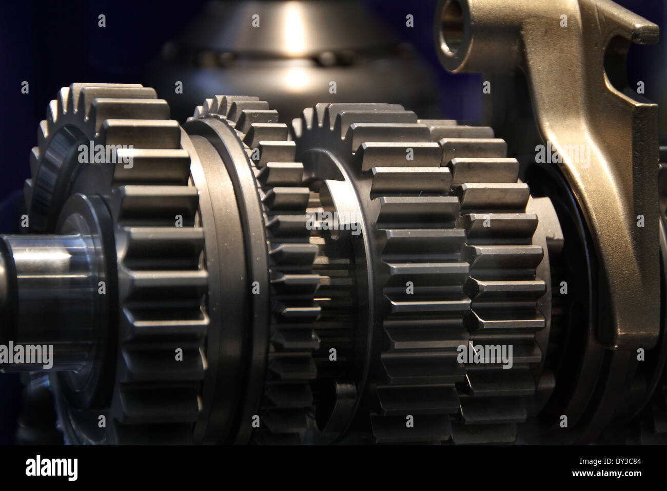 Cut away view of high performance racing gearbox showing cogs and teeth ...