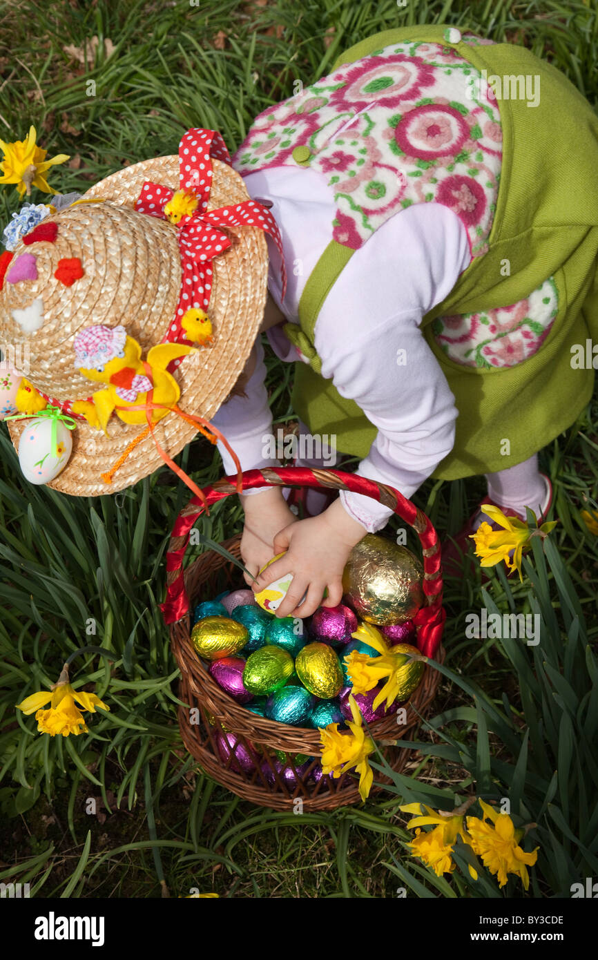 Girl on an Easter egg hunt in Lancashire, UK Stock Photo - Alamy