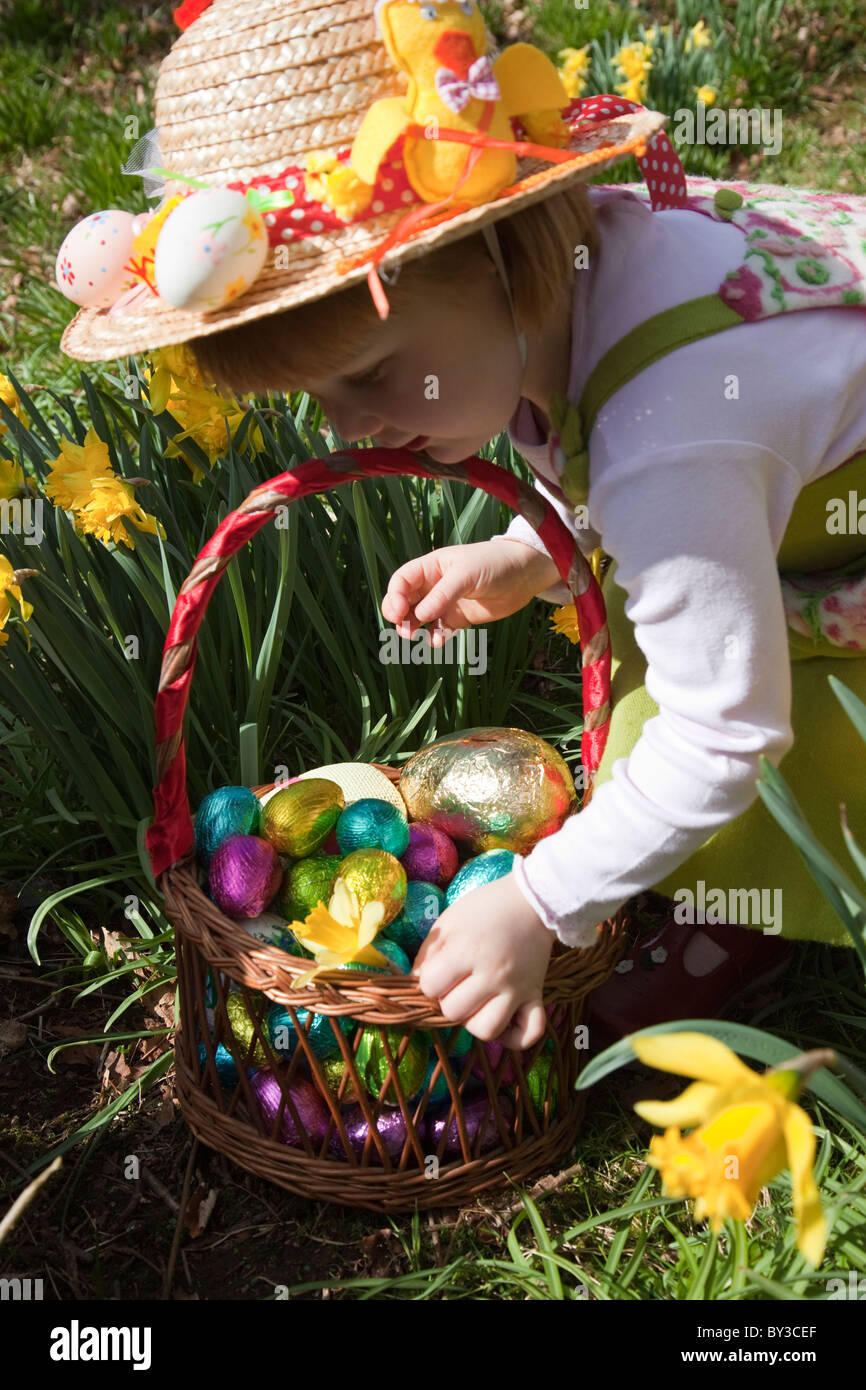 Girl on an Easter egg hunt in Lancashire, UK Stock Photo - Alamy