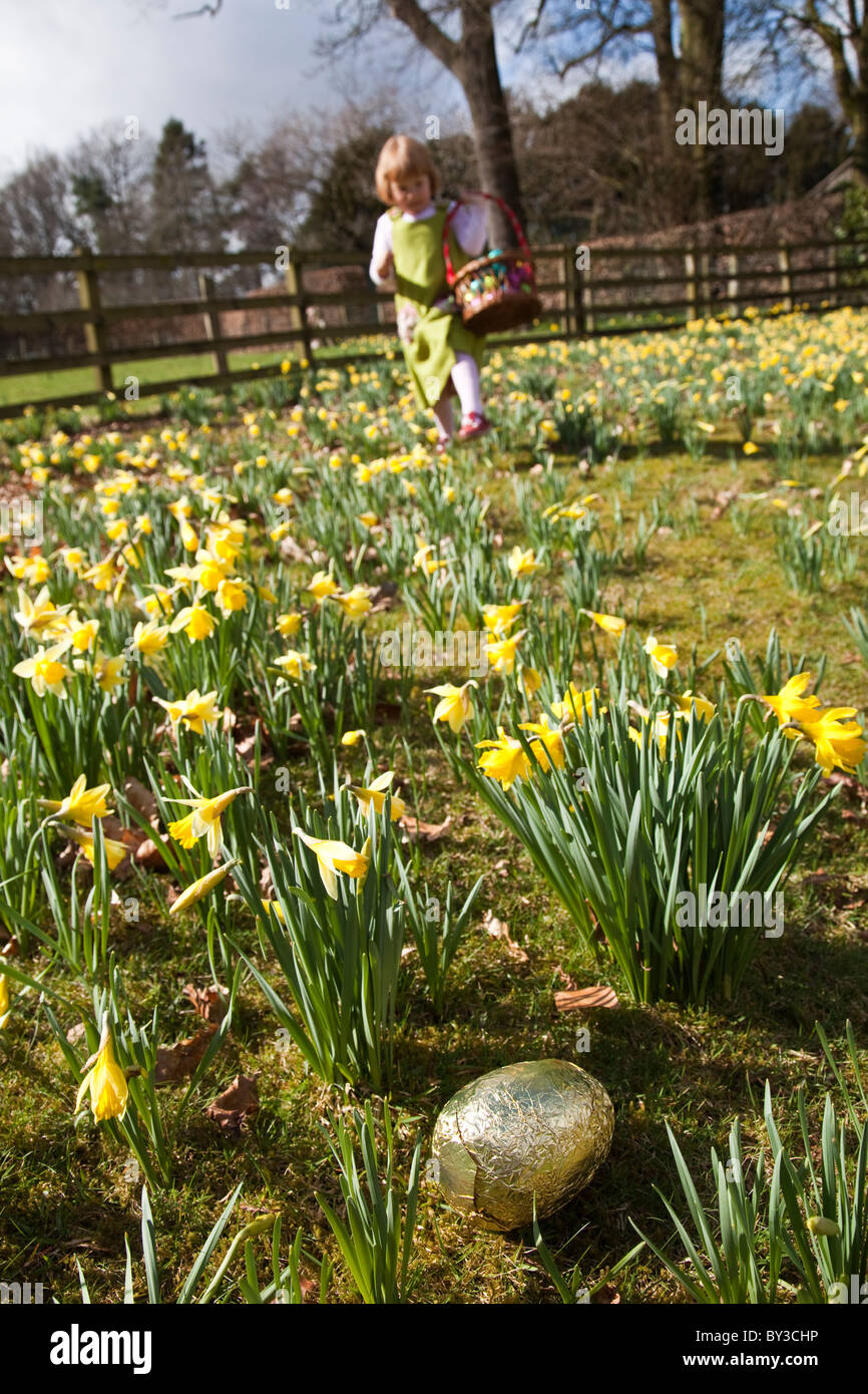 Girl on an Easter egg hunt in Lancashire, UK Stock Photo - Alamy