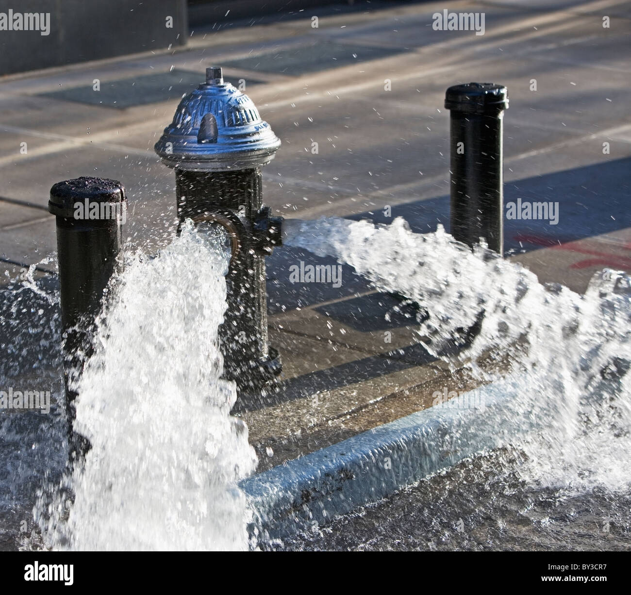 USA, New York City, hydrant pouring out water Stock Photo - Alamy