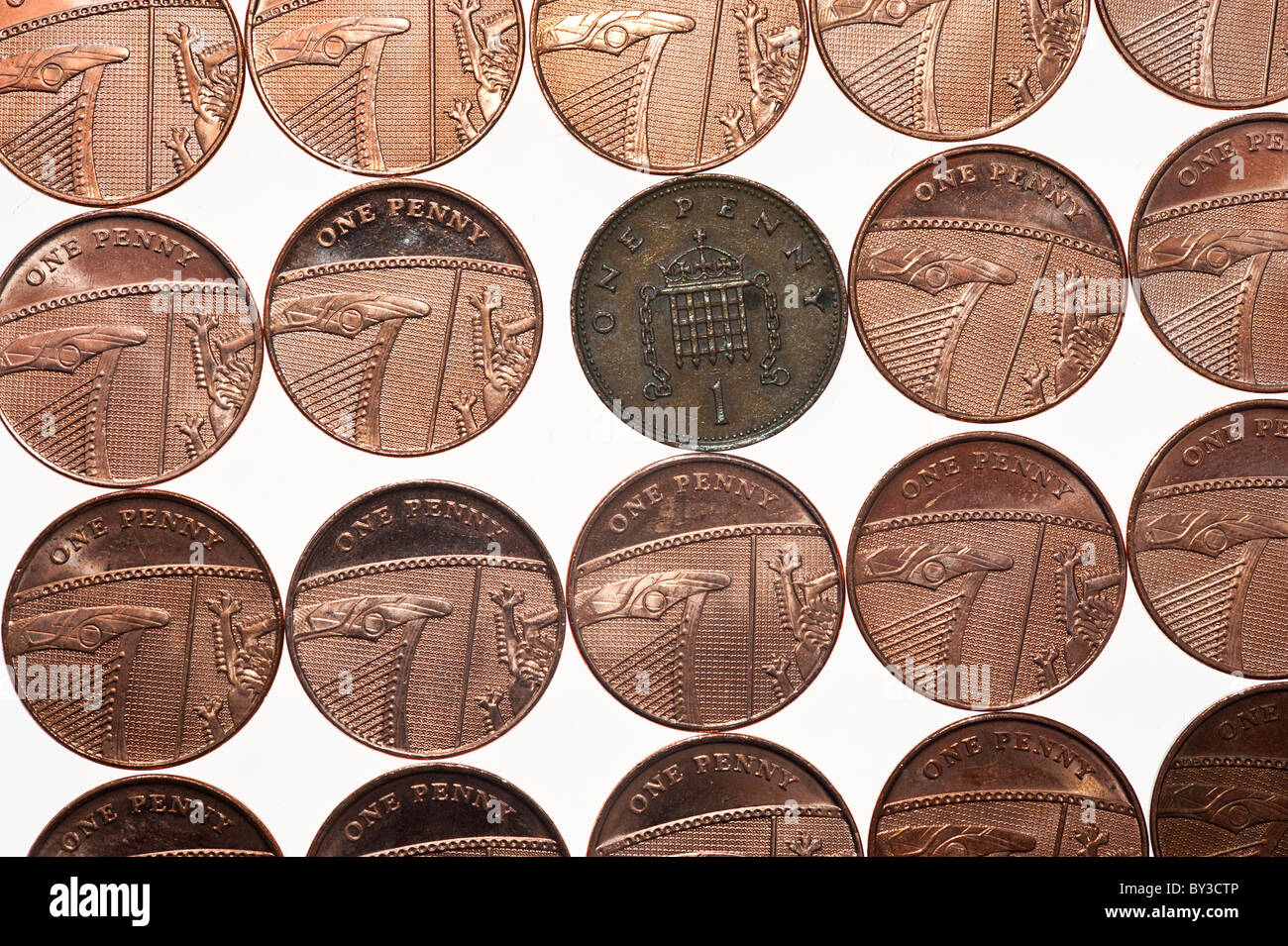 One penny is the odd-one-out Stock Photo - Alamy