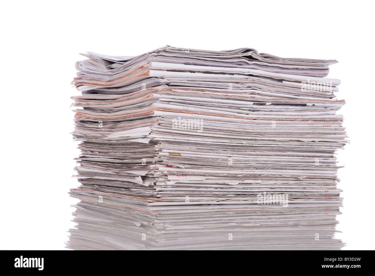 Stack of newspaper isolated on white Stock Photo - Alamy