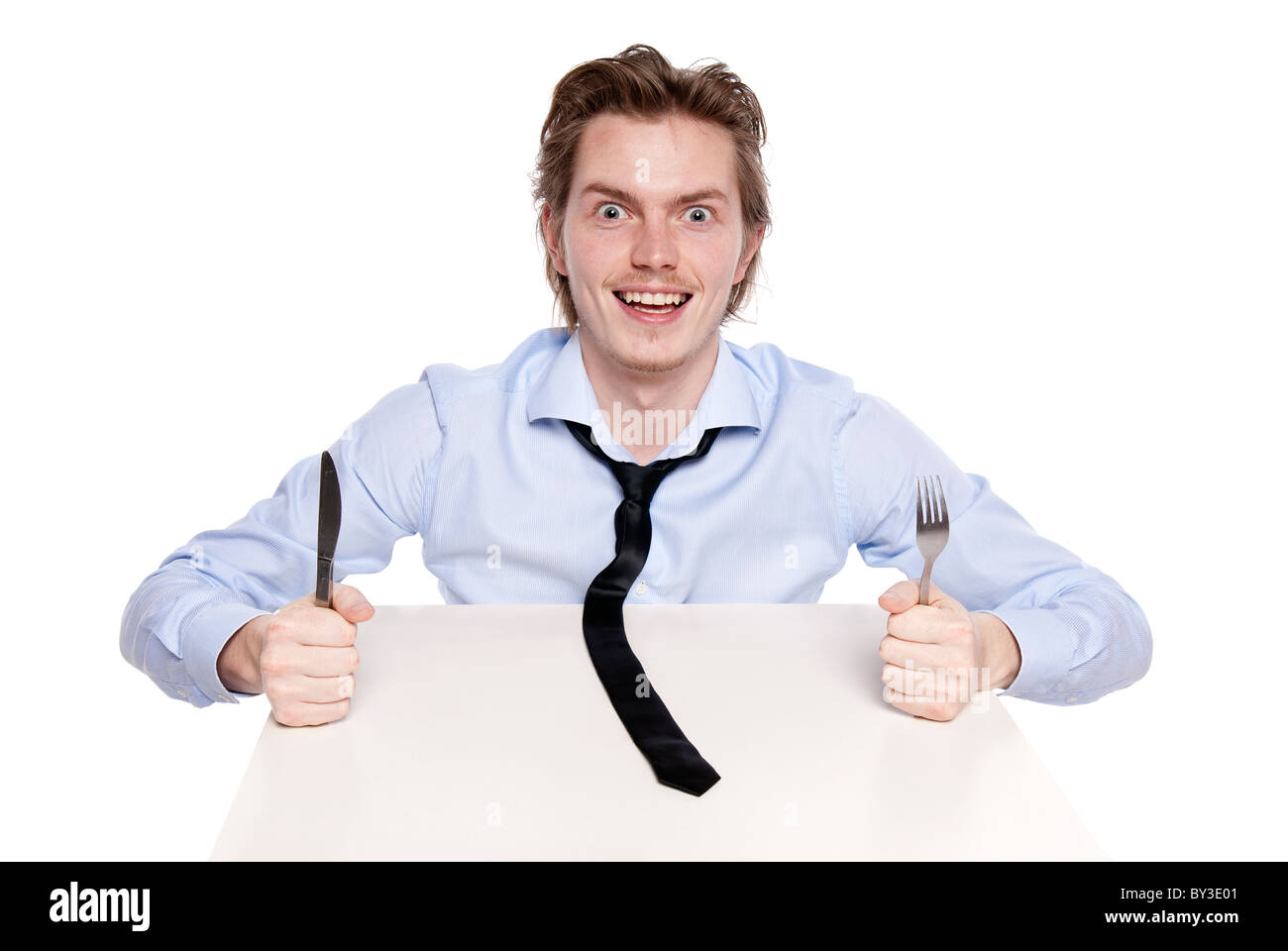 Young man is hungry. Studio photo of hungry man, isolated on white ...
