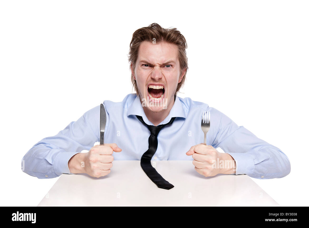 Young man is hungry. Studio photo of hungry man, isolated on white ...