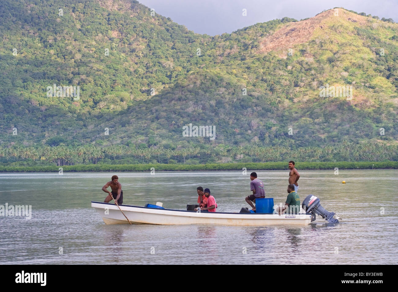 Fijian men in a small boat in Vanua Levu, Fiji Stock Photo - Alamy