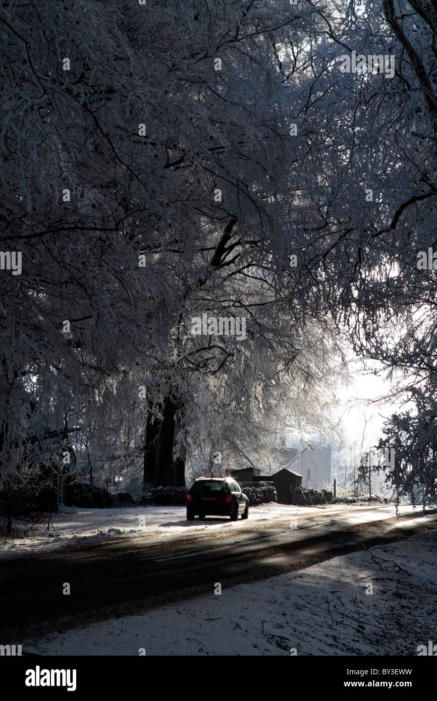 Snow covered roads make driving hazardous in winter Stock Photo - Alamy