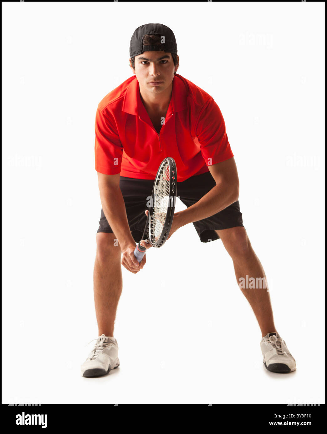 Young man playing tennis Stock Photo - Alamy