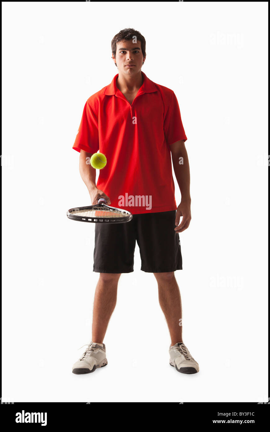 Young man playing tennis Stock Photo - Alamy
