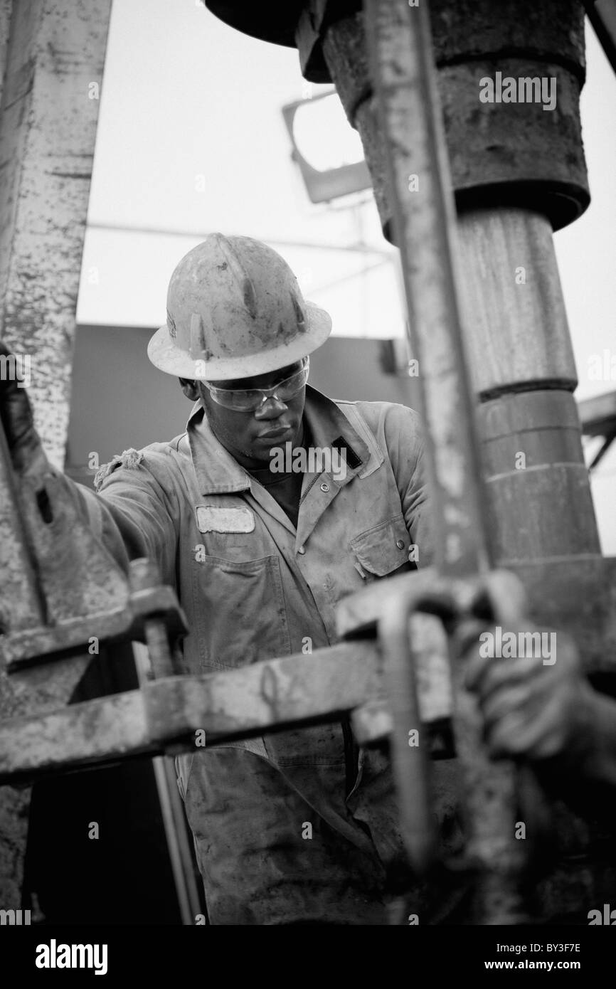 Young man worker glasses Black and White Stock Photos & Images - Alamy