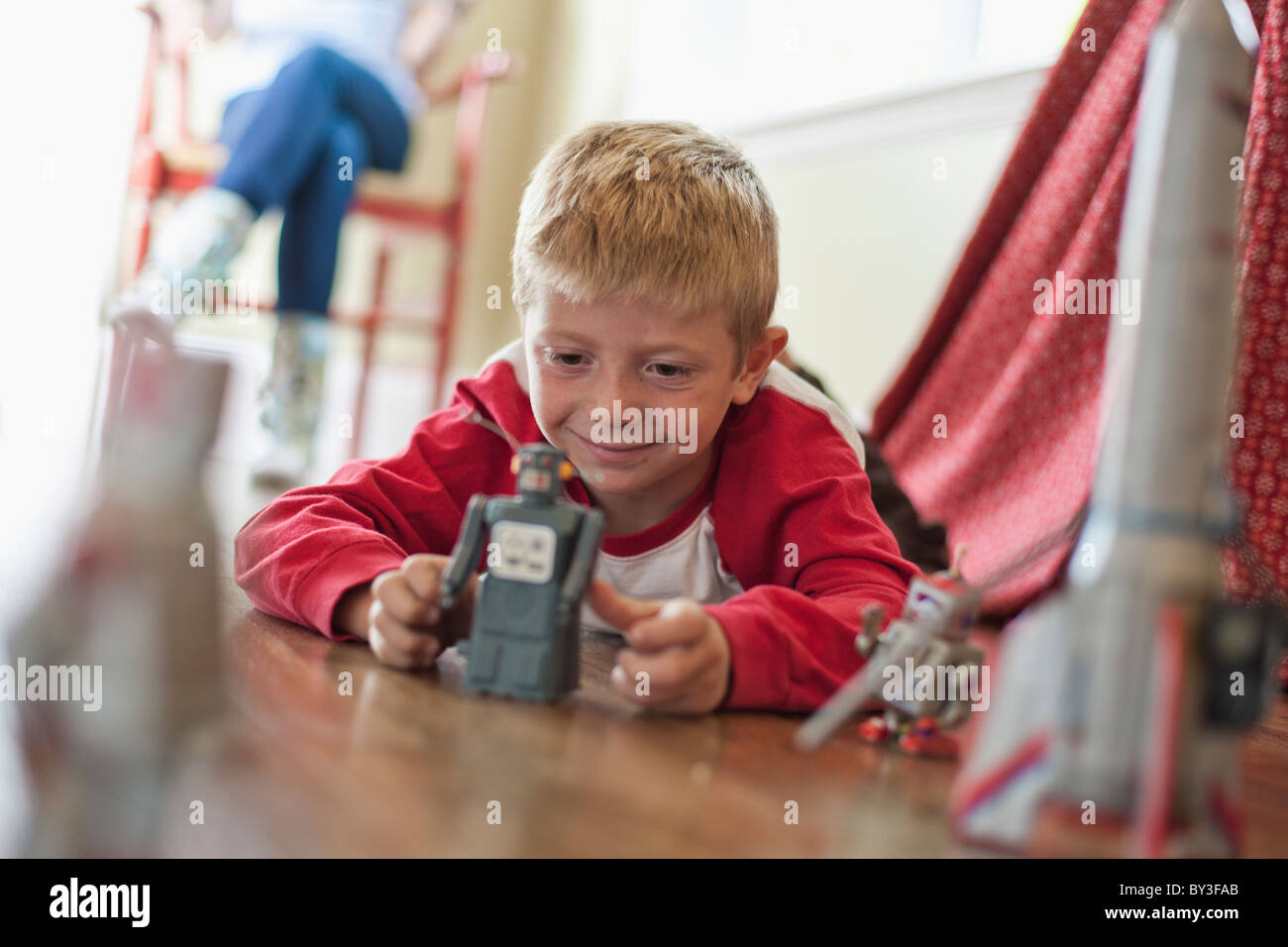 Boy playing in toy rocket hi-res stock photography and images - Alamy