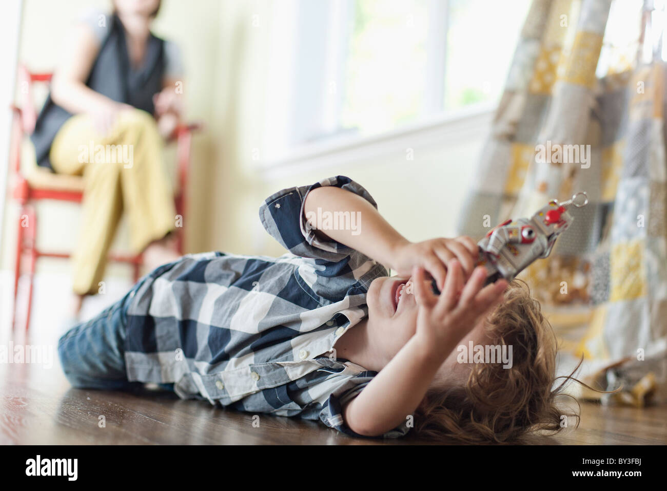 USA, Utah, Boy (2-3) playing on floor Stock Photo - Alamy
