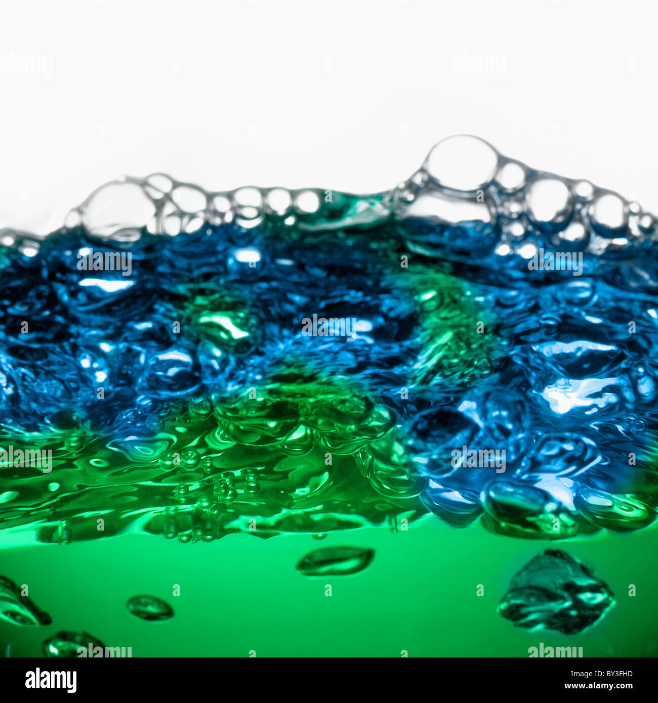 Close up of blue and green water surface with bubbles Stock Photo - Alamy