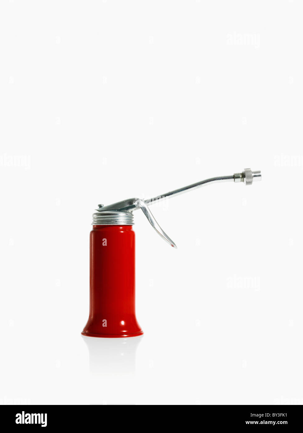 Studio shot of red oil can Stock Photo - Alamy