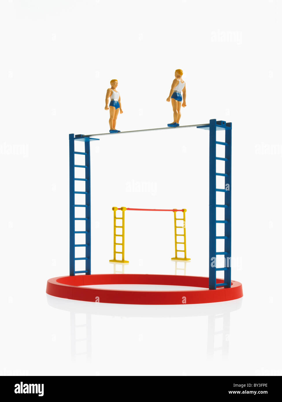 Studio shot of figurines on ladders Stock Photo - Alamy
