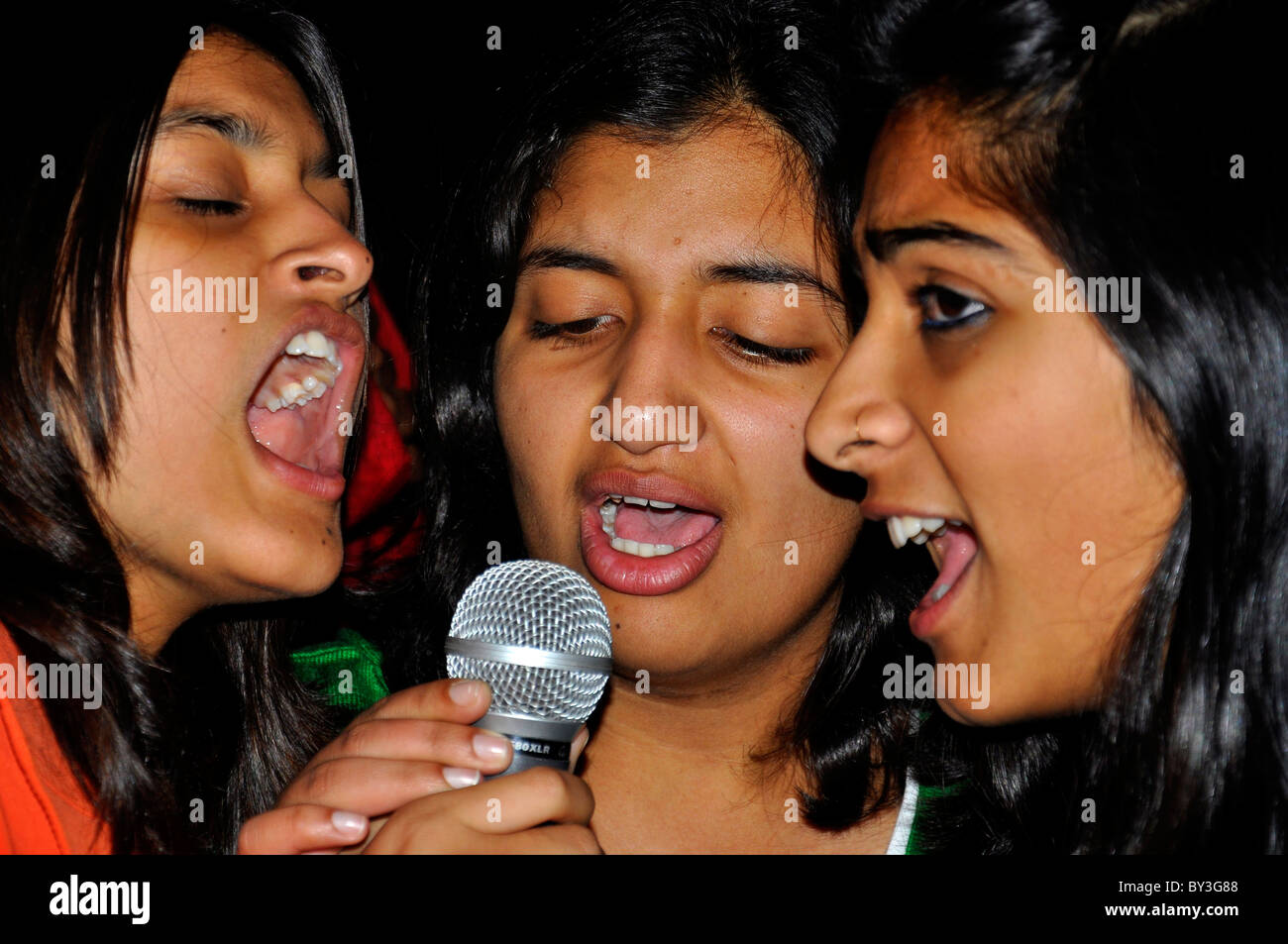 Indian singing hi-res stock photography and images - Alamy