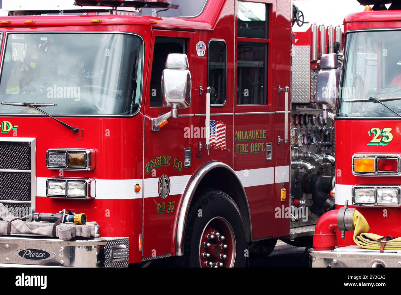 Two Milwaukee Fire Trucks lined up at fire emergency scene Wisconsin ...
