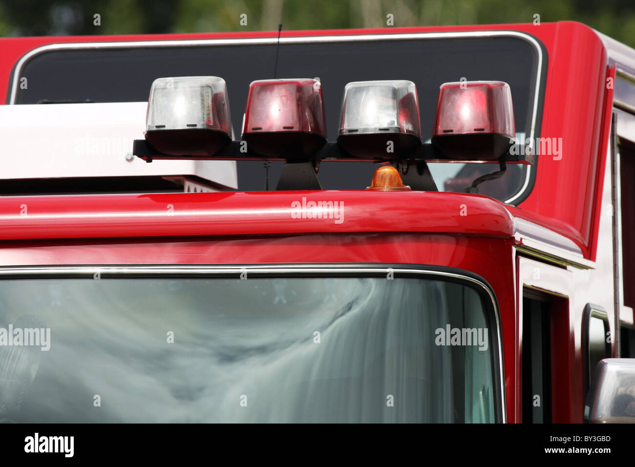 A Fire Department truck vehicle with red and white lights Stock Photo ...