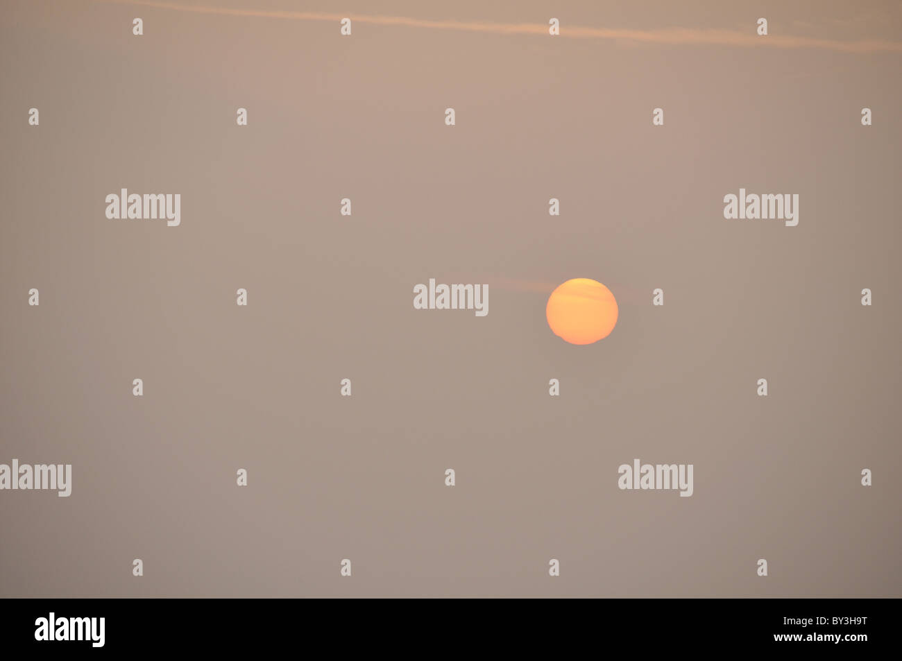 Close up of bright orange sun in winter Stock Photo - Alamy