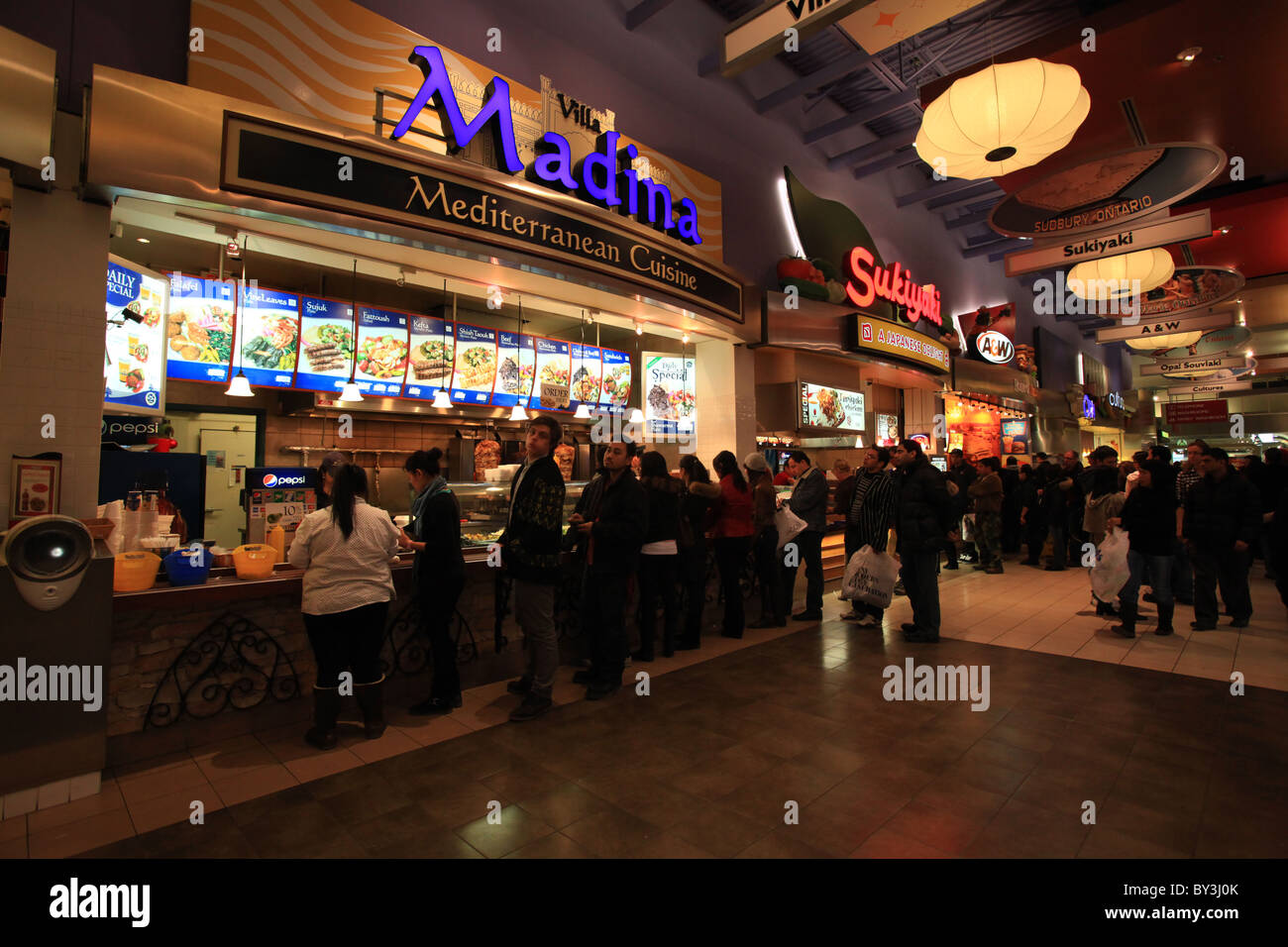Crowd lining up in front of Madina food court in Vaughan Mills Mall in ...