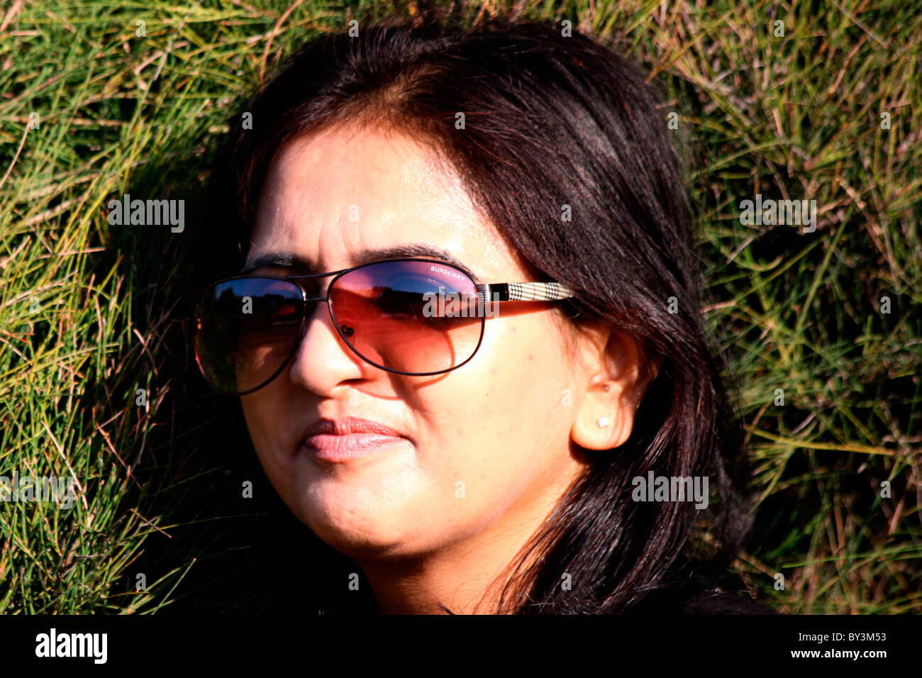 Portrait indian woman against tree hi-res stock photography and images ...