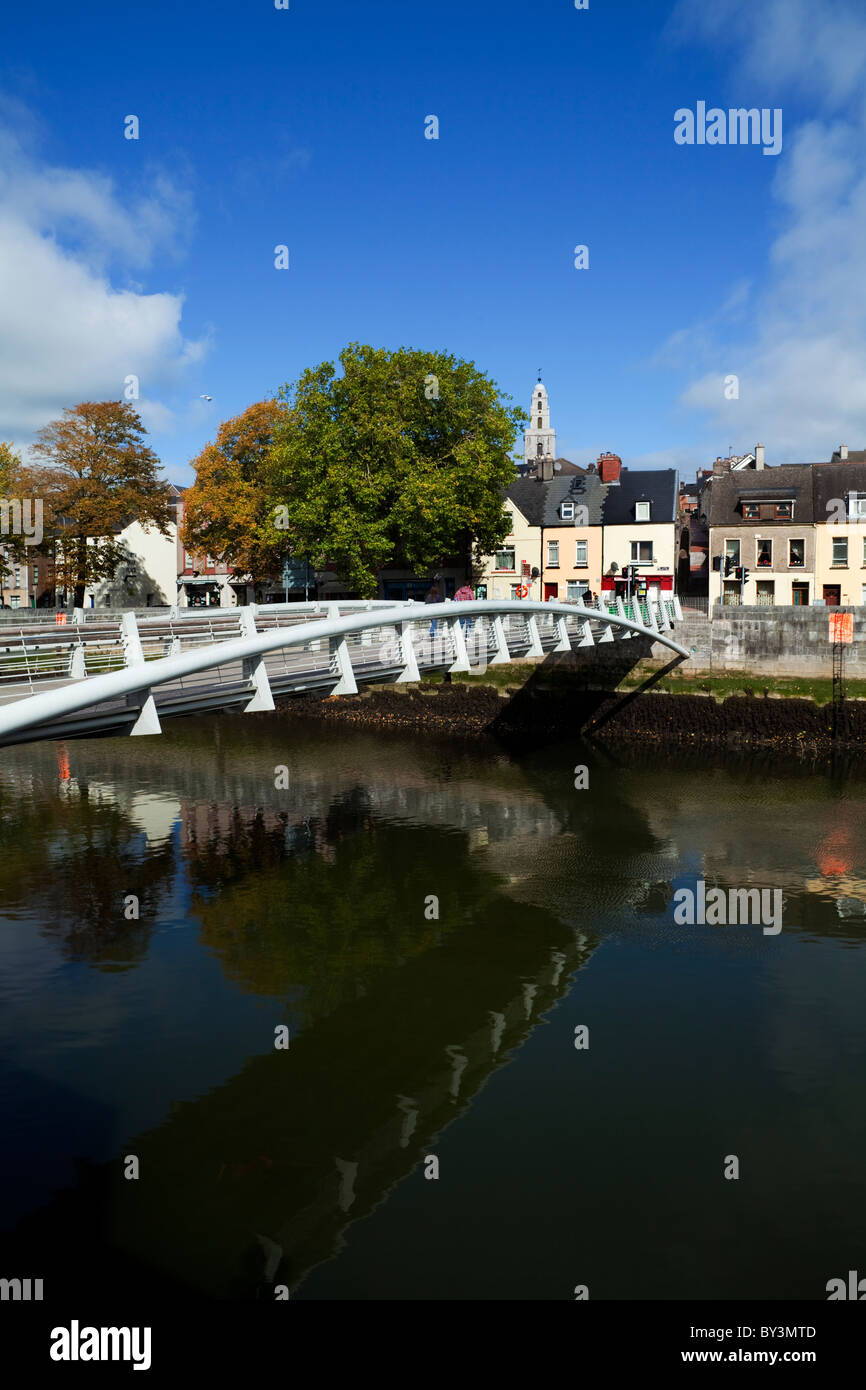 The Millenium Foot Bridge over the River Lee, with the Shandon Tower ...