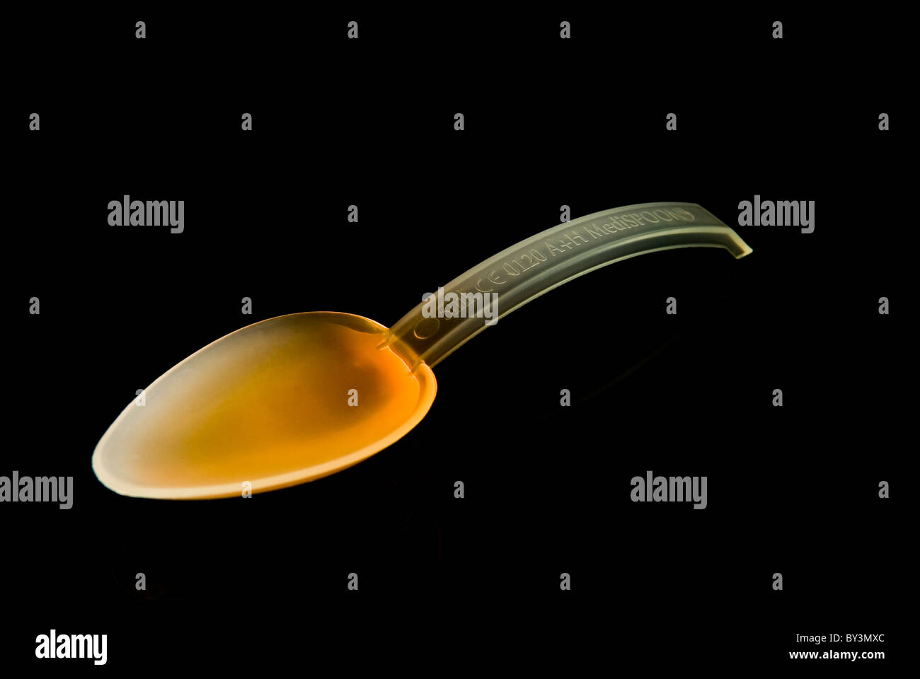 Spoonful of liquid medicine hi-res stock photography and images - Alamy