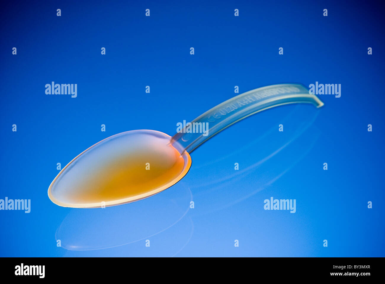 Spoonful of liquid medicine hi-res stock photography and images - Alamy