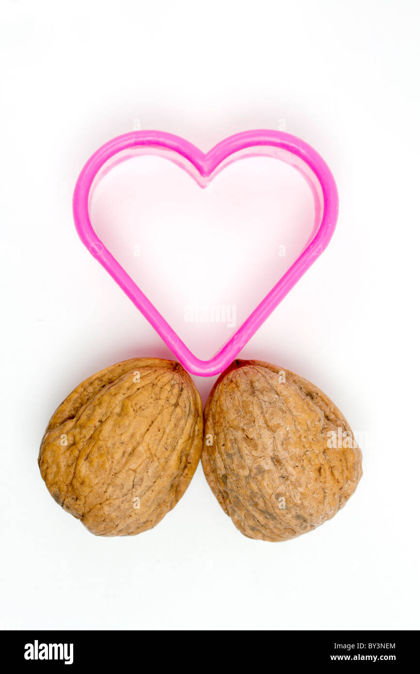 Nuts heart background Cut Out Stock Images & Pictures - Alamy