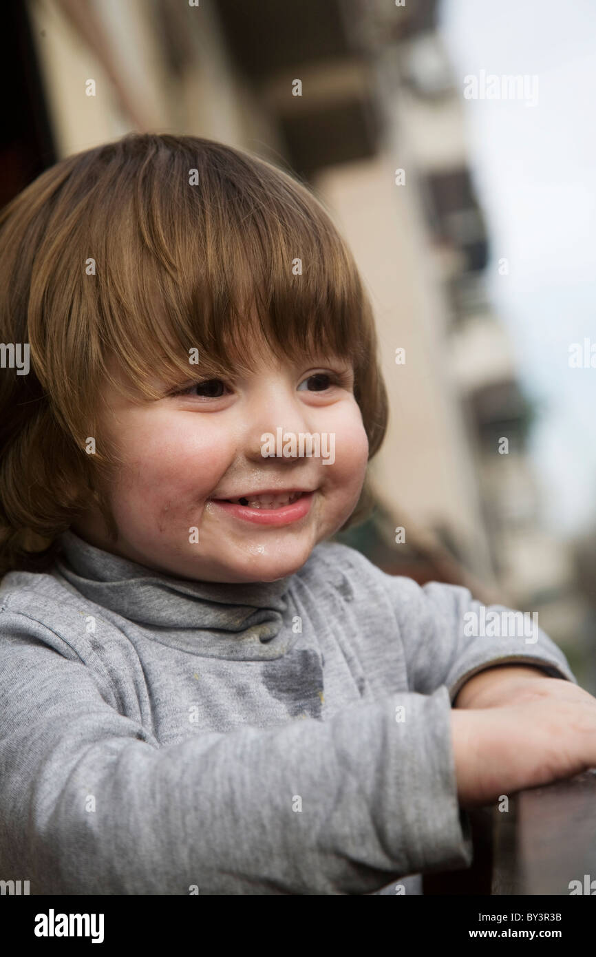 Toddler looking over railing hi-res stock photography and images - Alamy